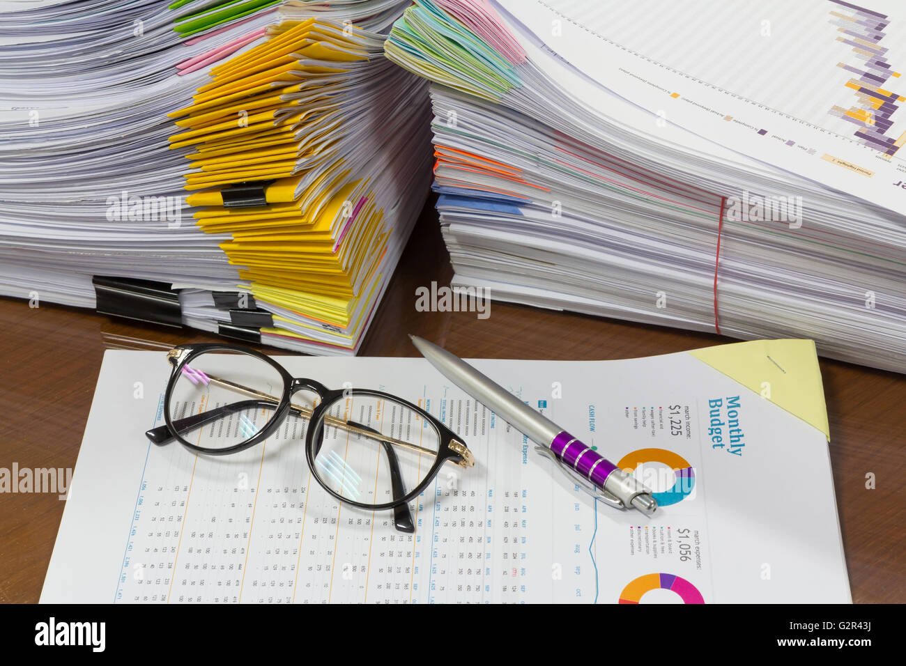 Analysis chart and paperwork on office table Stock Photo - Alamy