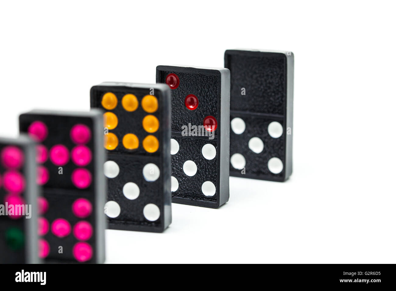 Stack of dominoes isolated on a white background Stock Photo - Alamy