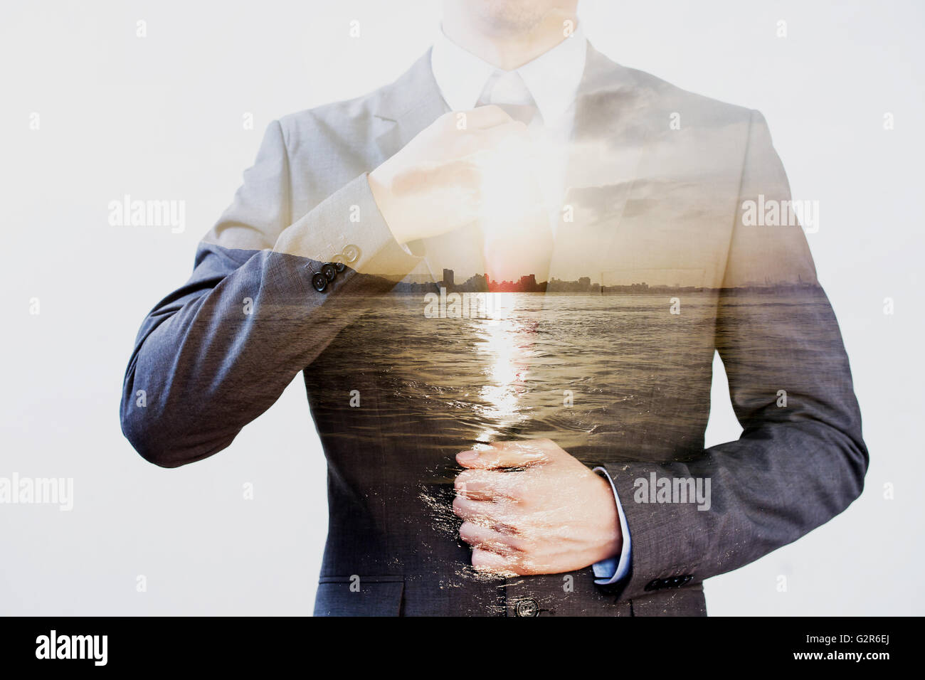 Double Exposure of businessman in offshore sunset sea background Stock ...