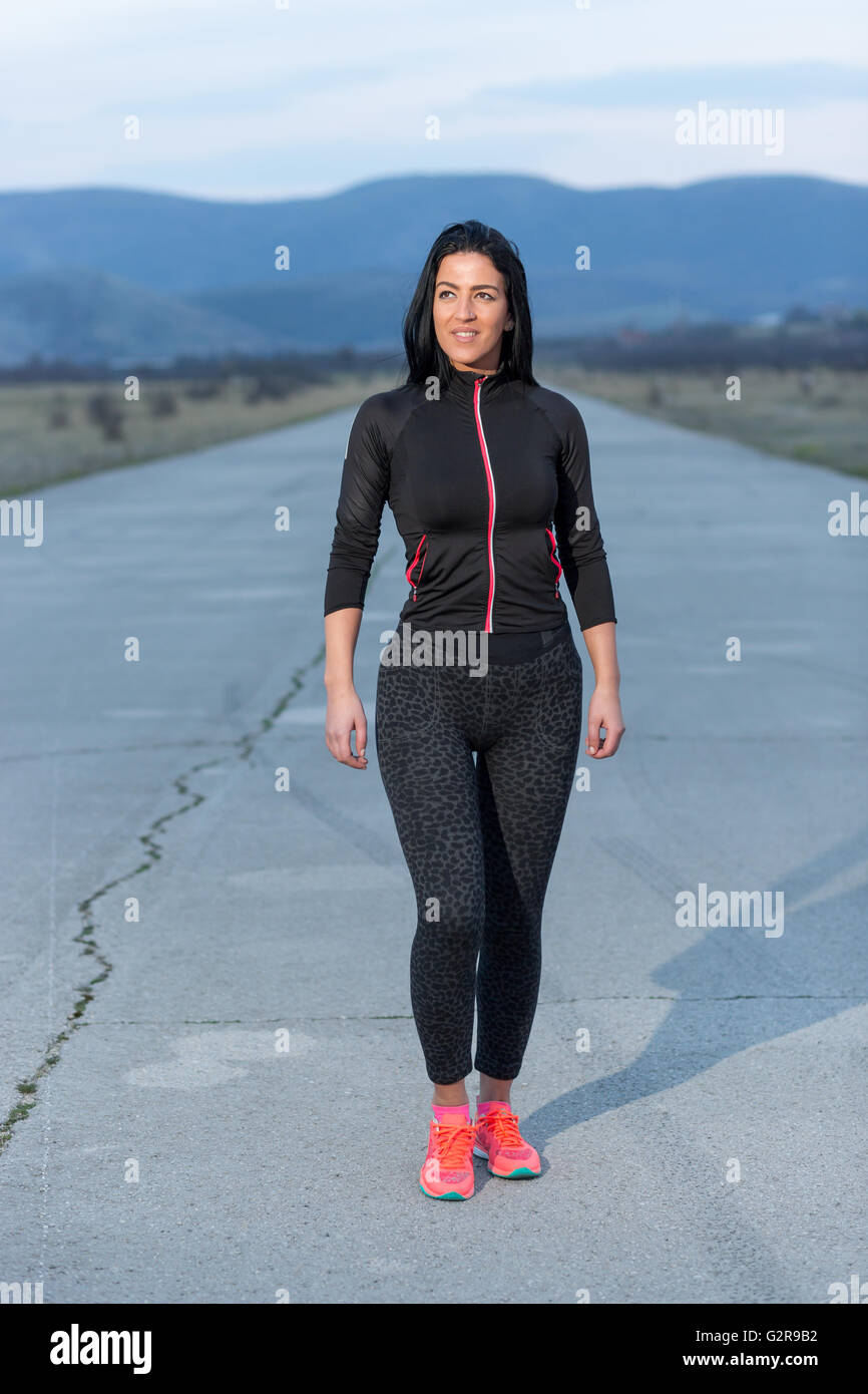 Woman jogging park night hi-res stock photography and images - Alamy