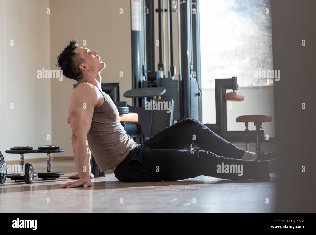 Muscular Man Resting After Exercise Stock Photo - Alamy