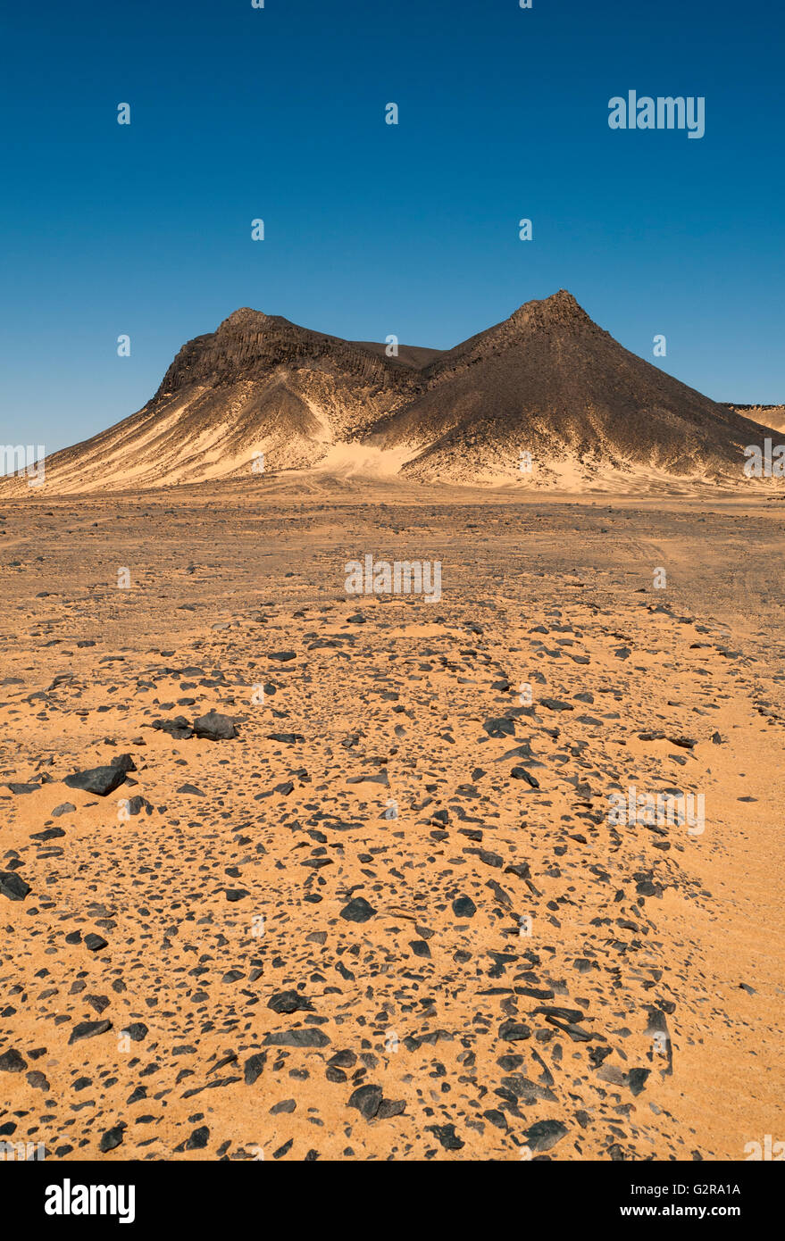 Volcanic mountains of Black Desert, Black Desert, Bahariya, Egypt Stock ...