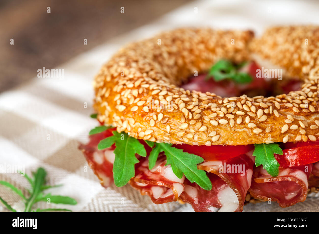 Bagel sandwich with pepperoni Stock Photo - Alamy