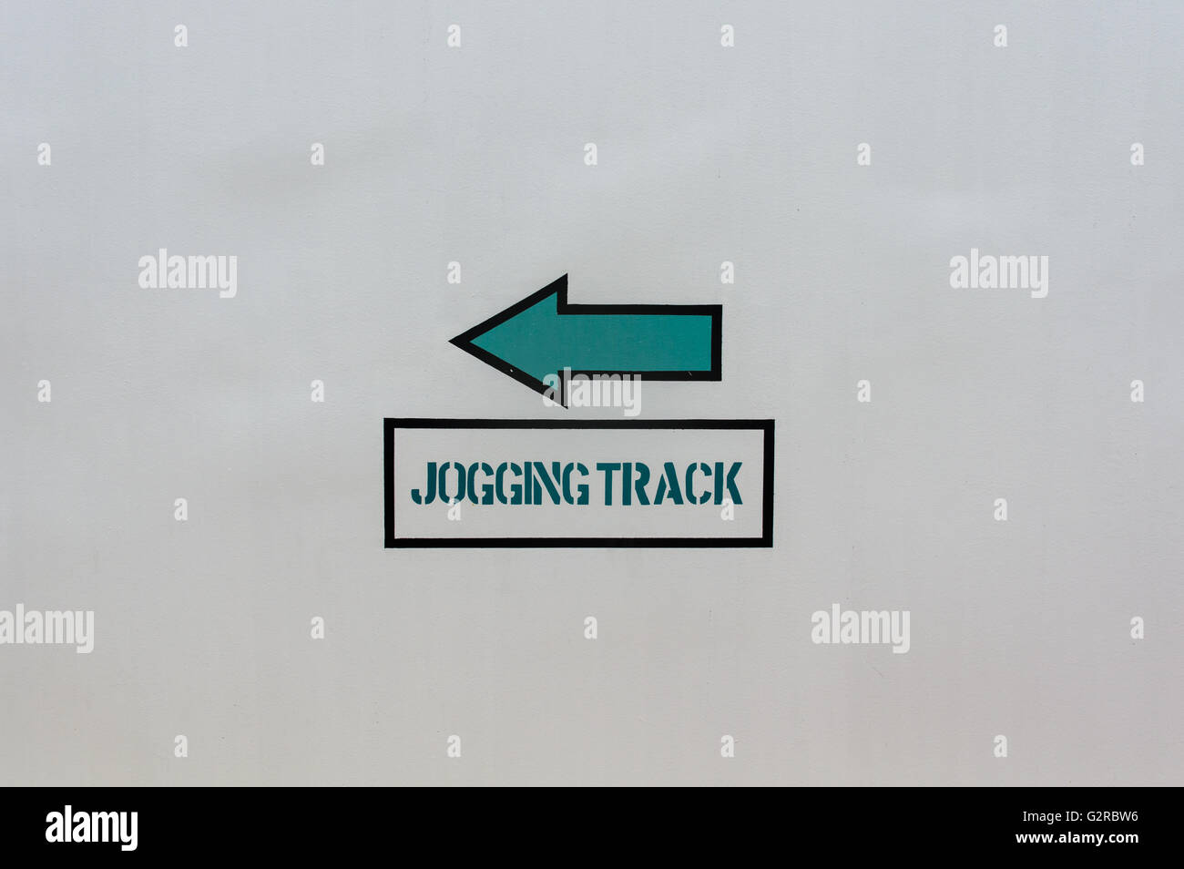 Jogging Track sign with arrow on a cruise ship Stock Photo - Alamy