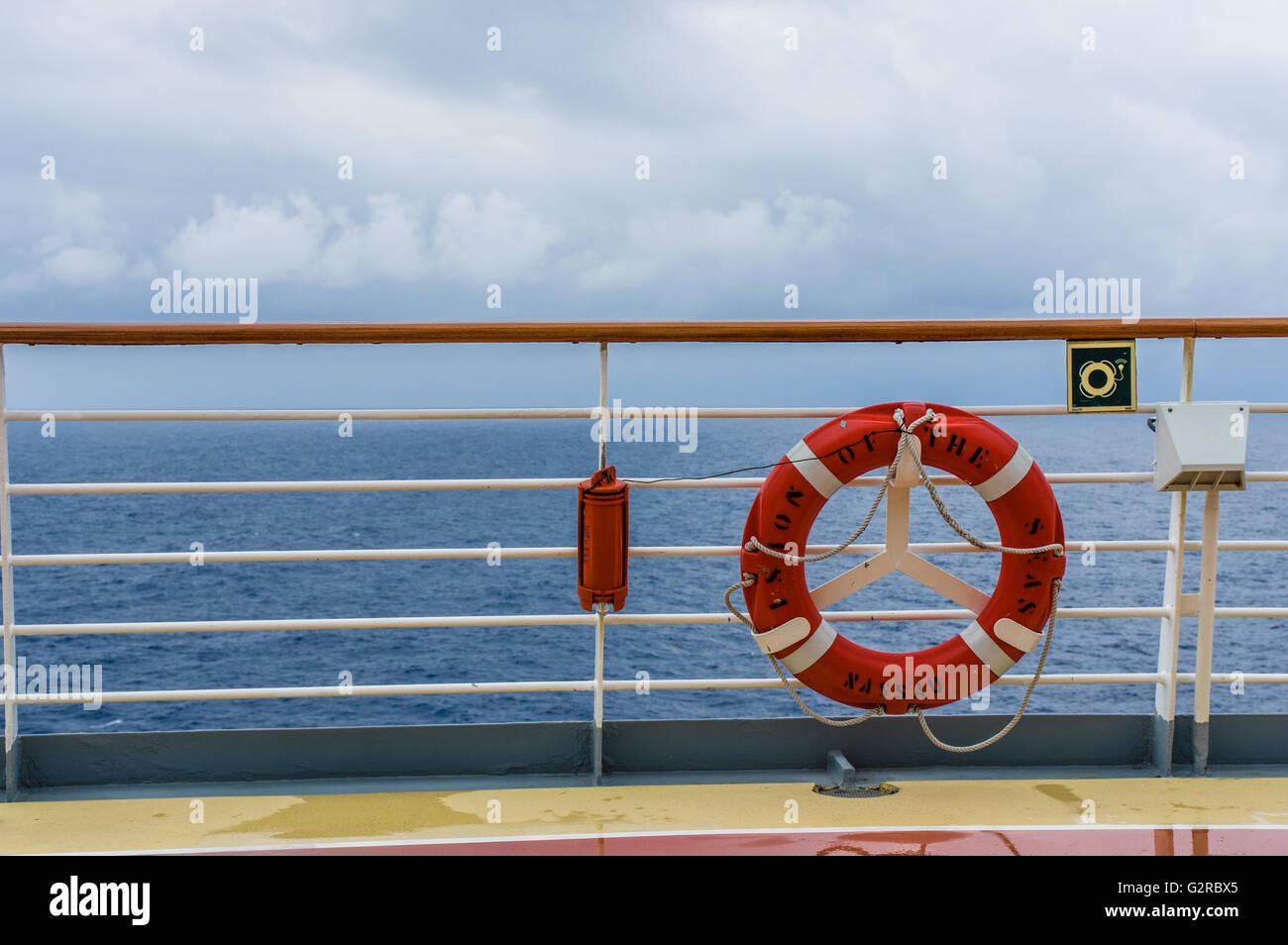 Orange life ring or preserver on board a cruise ship Stock Photo - Alamy