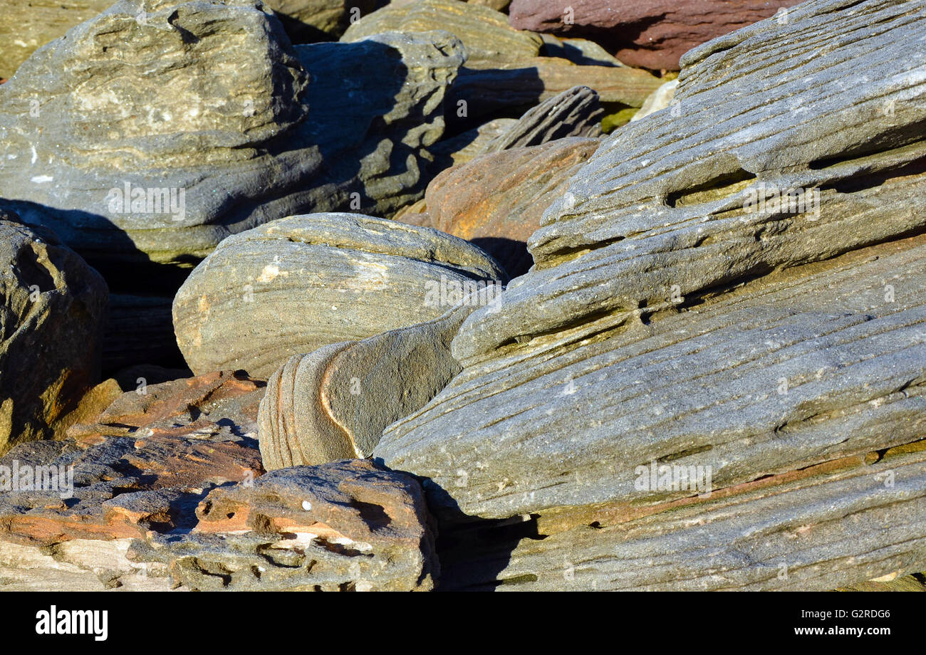 Varied patterns, colours, shapes and layers of natural weathered ...