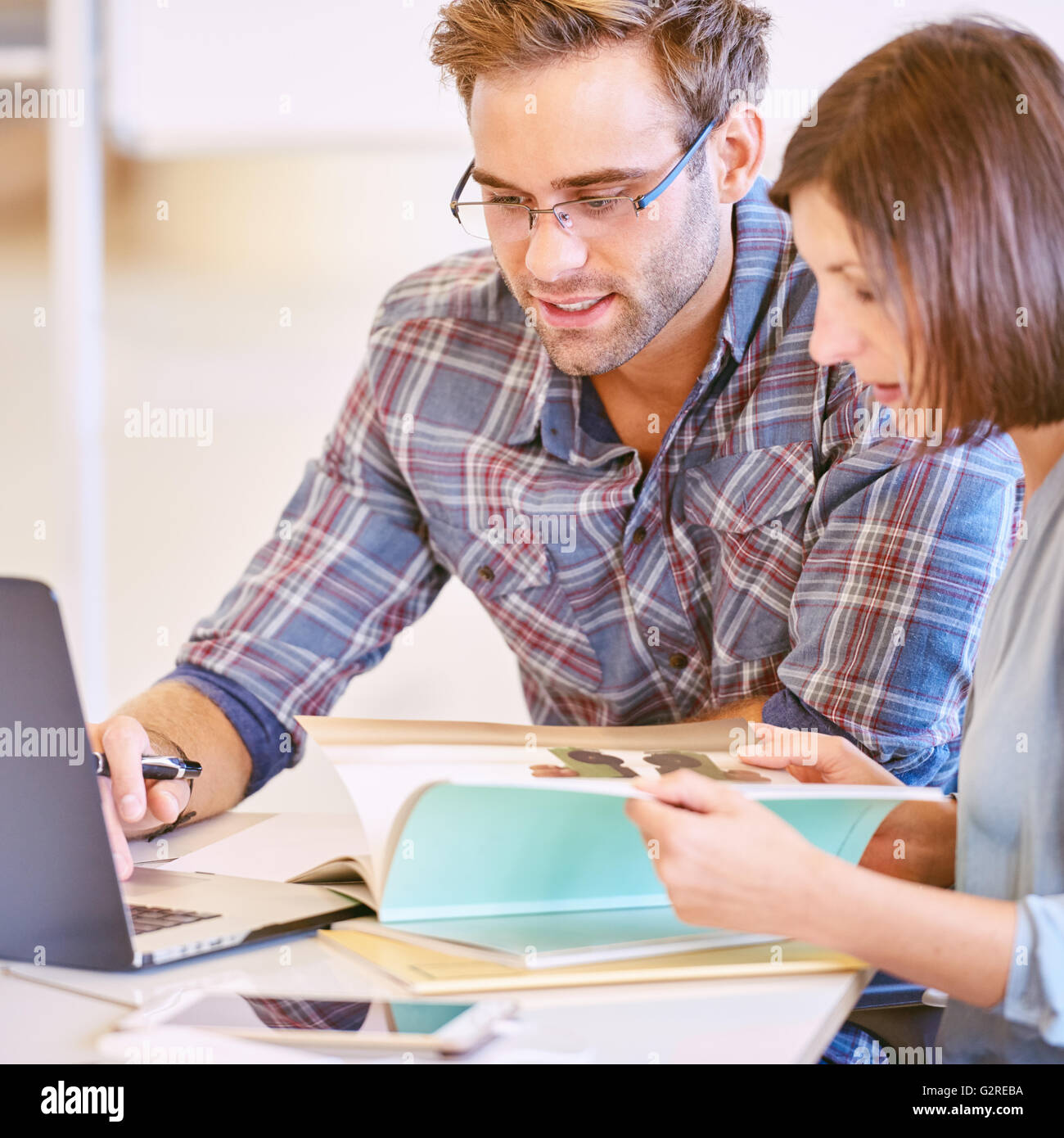 Busy working together hi-res stock photography and images - Alamy