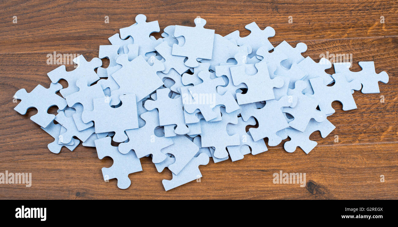 Pile of jigsaw puzzle pieces hi-res stock photography and images - Alamy