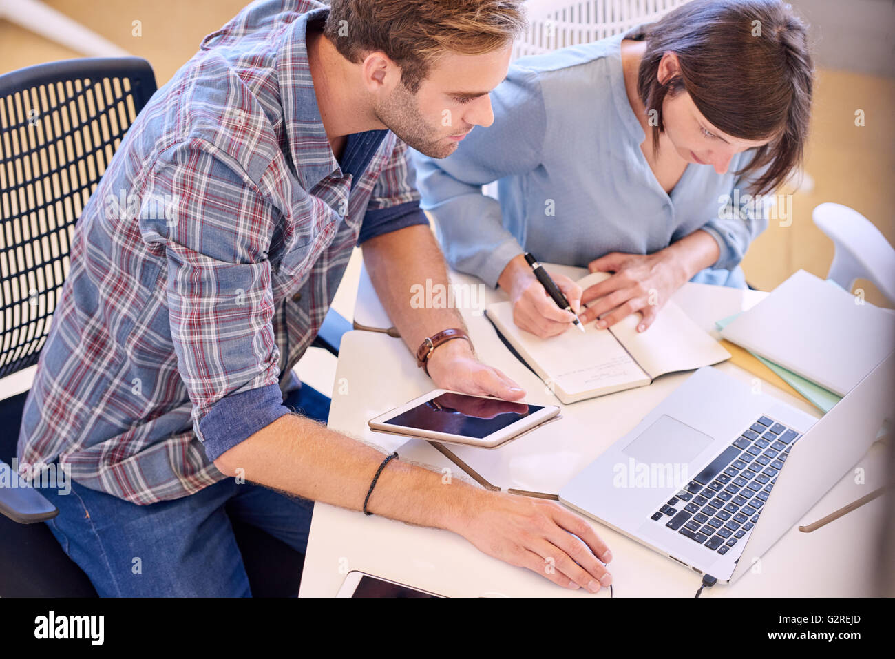 Taking notes woman using hi-res stock photography and images - Alamy