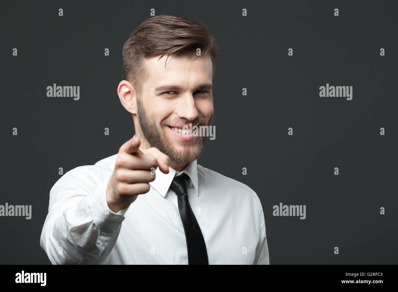 Businessman pointing on sign hi-res stock photography and images - Alamy