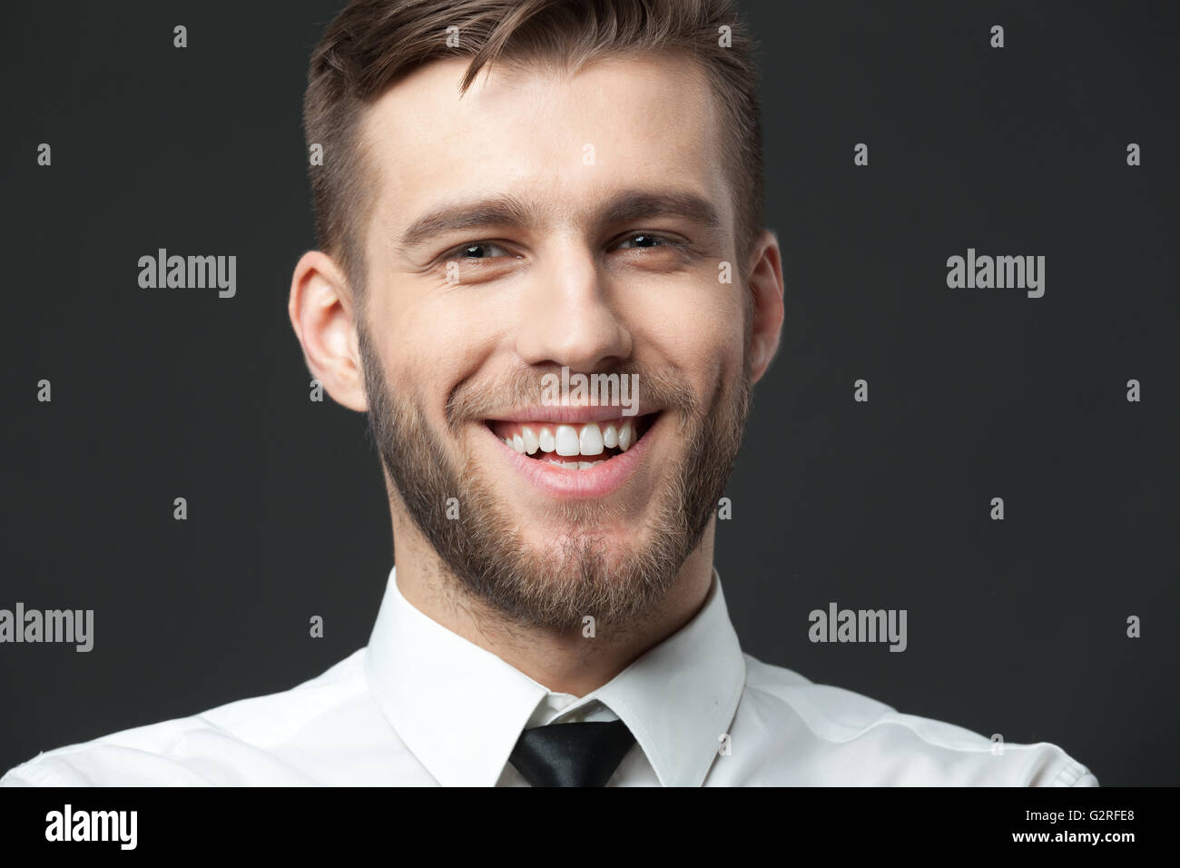 I am young and successful! Studio portrait of handsome young ...