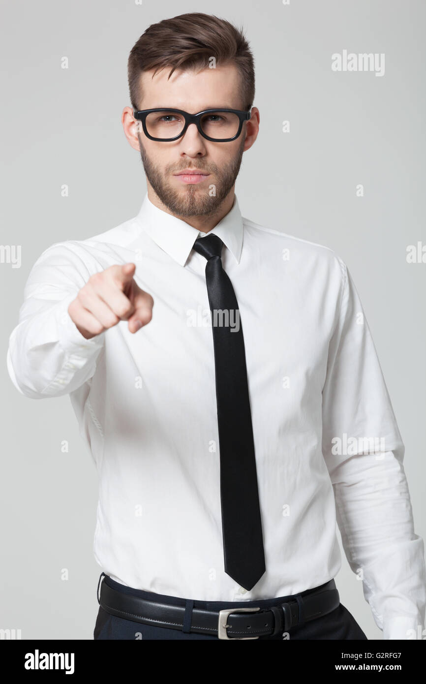Hey You! Young handsome businessman pointing at you while isolated on ...