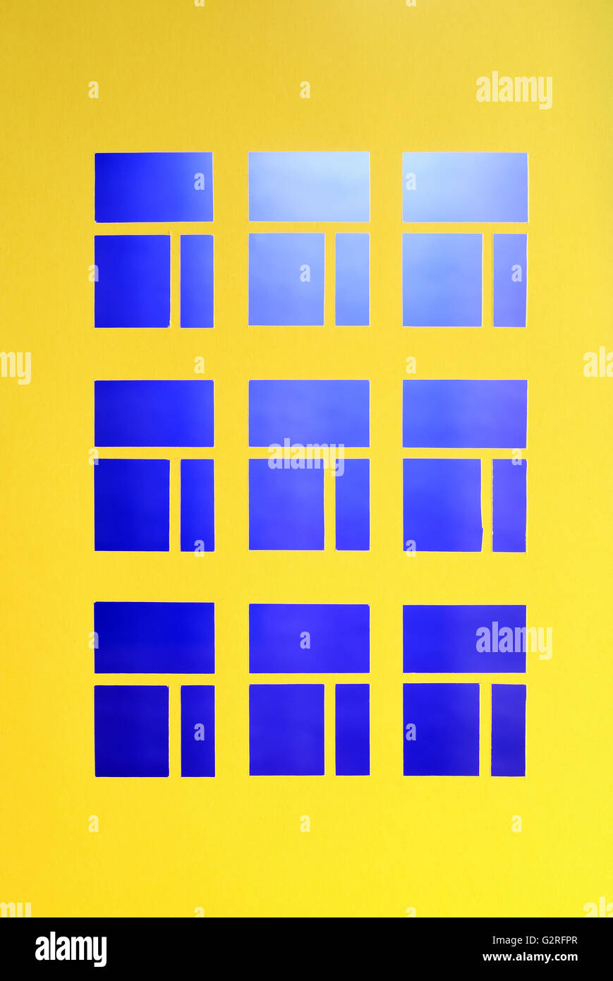 Paper house. Yellow paper house wall with cutting windows Stock Photo ...