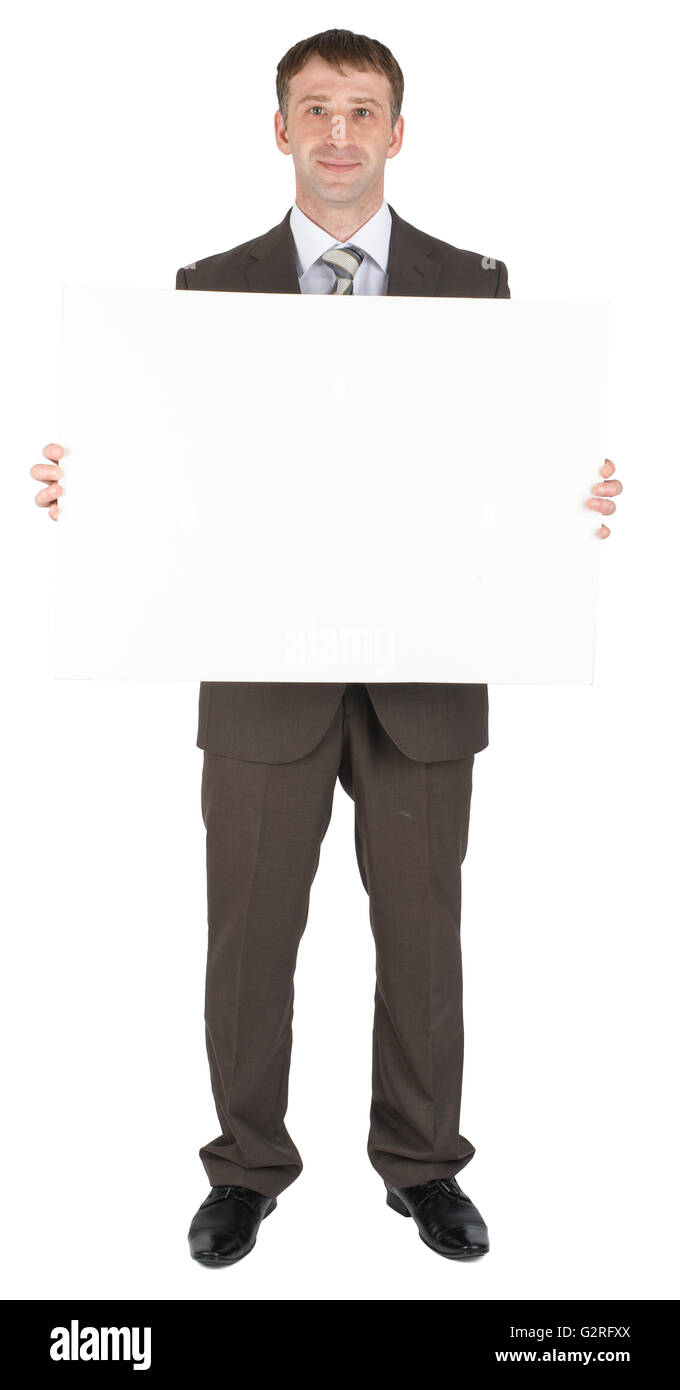 Businessman behind blank paper Stock Photo - Alamy