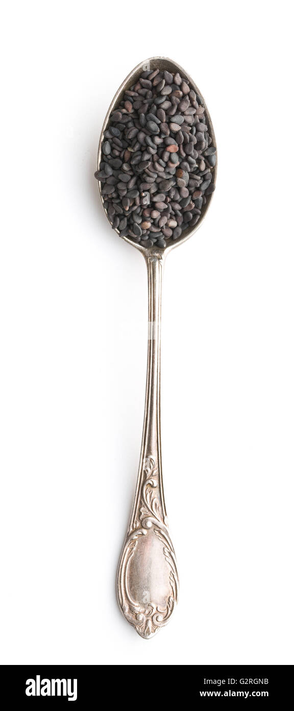 Black sesame seeds. Healthy sesame seeds in spoon isolated on white ...