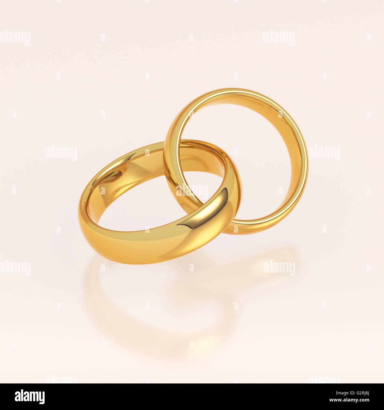 Two golden wedding rings Stock Photo - Alamy