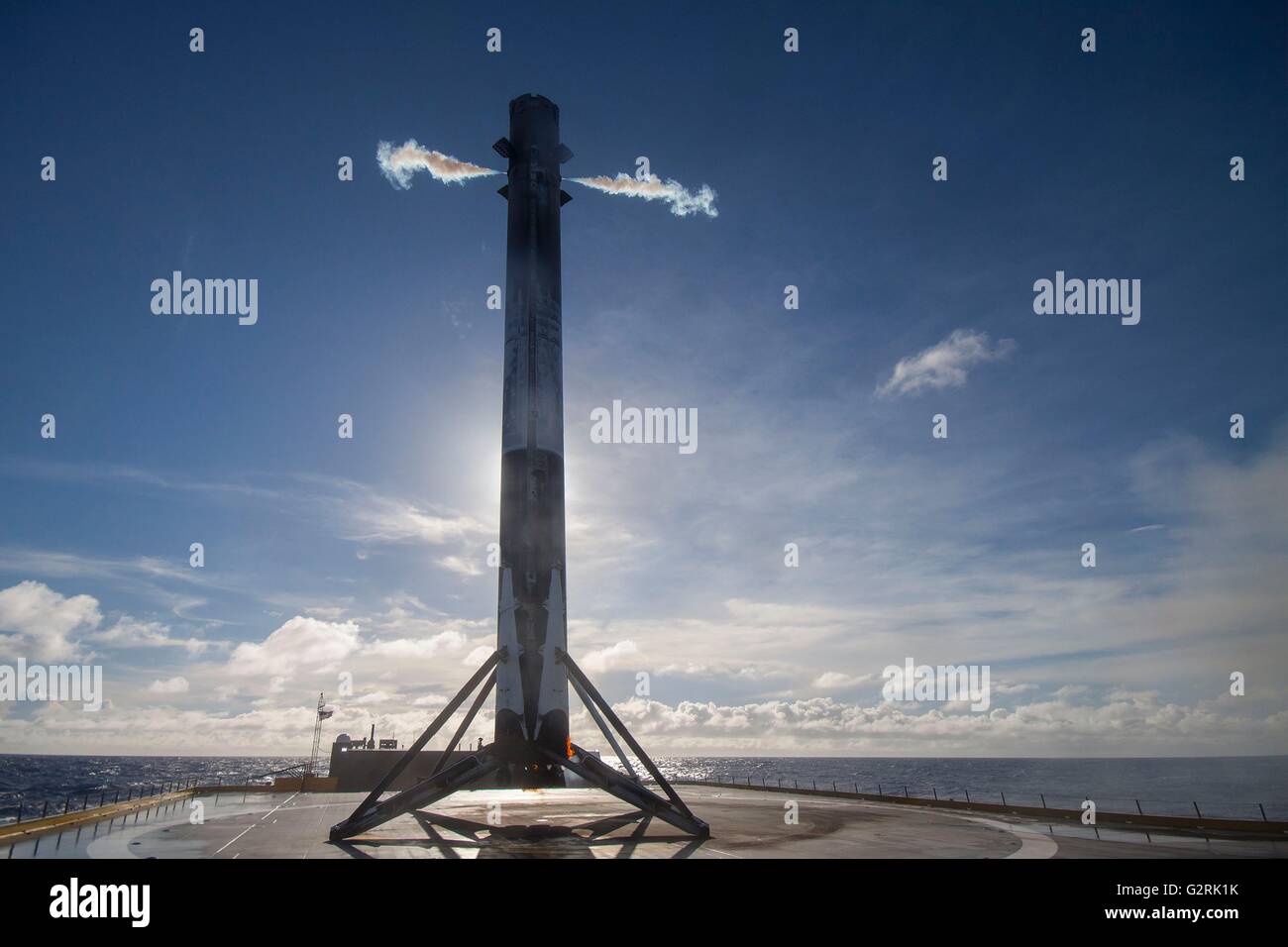 The SpaceX Falcon 9 reusable launch vehicle after touching down on a ...