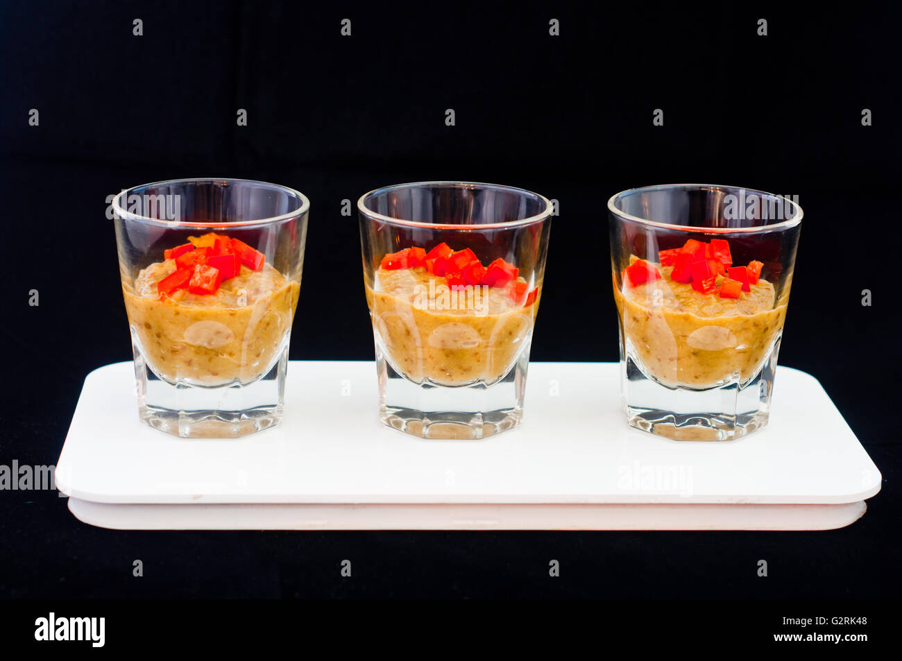 individual servings of soup vegetables with spicy chilli Stock Photo ...