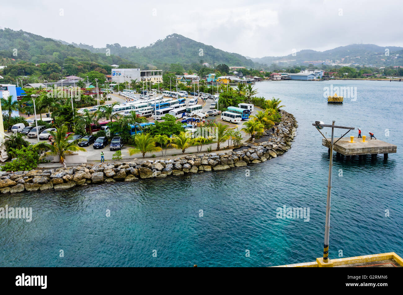 Bus staging area and parking for tour excursion buses at Port of Roatan ...