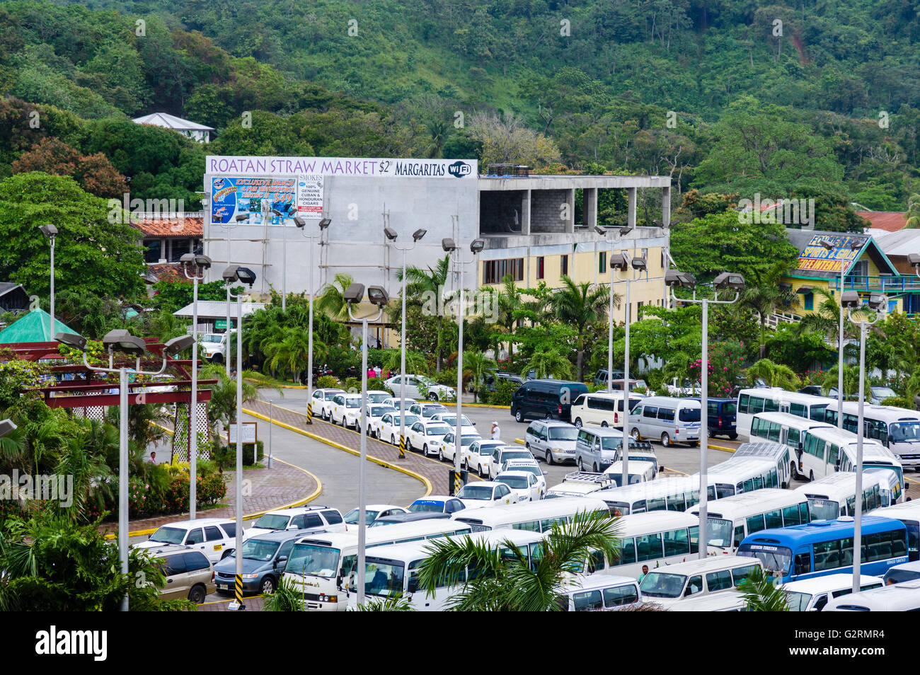 Bus staging area and parking for tour excursion buses at Port of Roatan ...