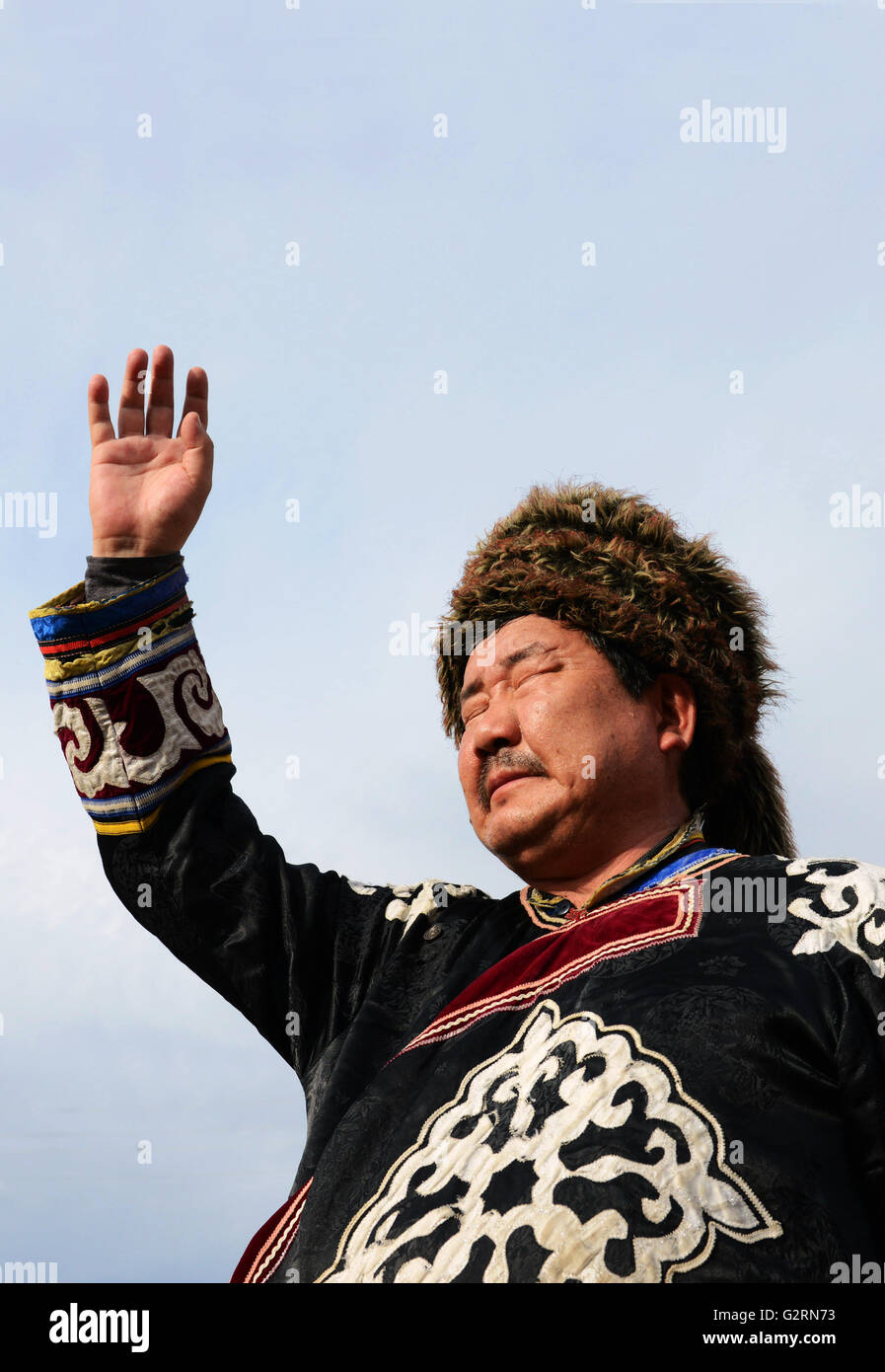 A Buryat Shaman conduction a traditional Shamanistic ceremony Stock ...