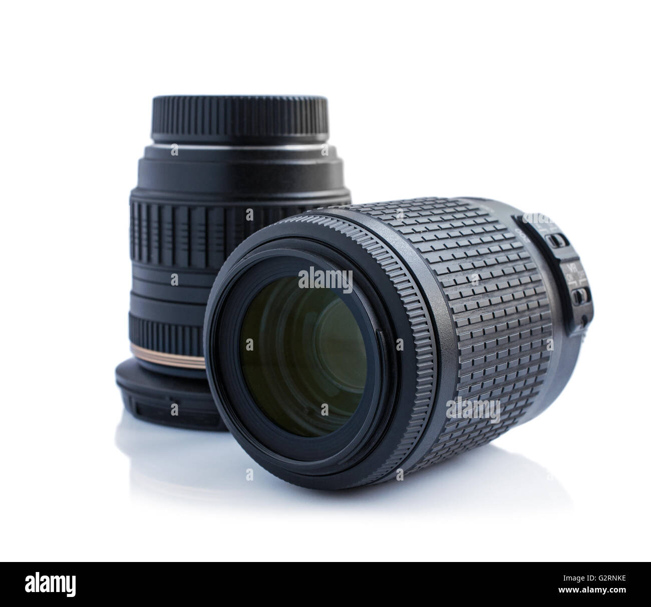 Wide-angle and telephoto camera lenses isolated on white background ...