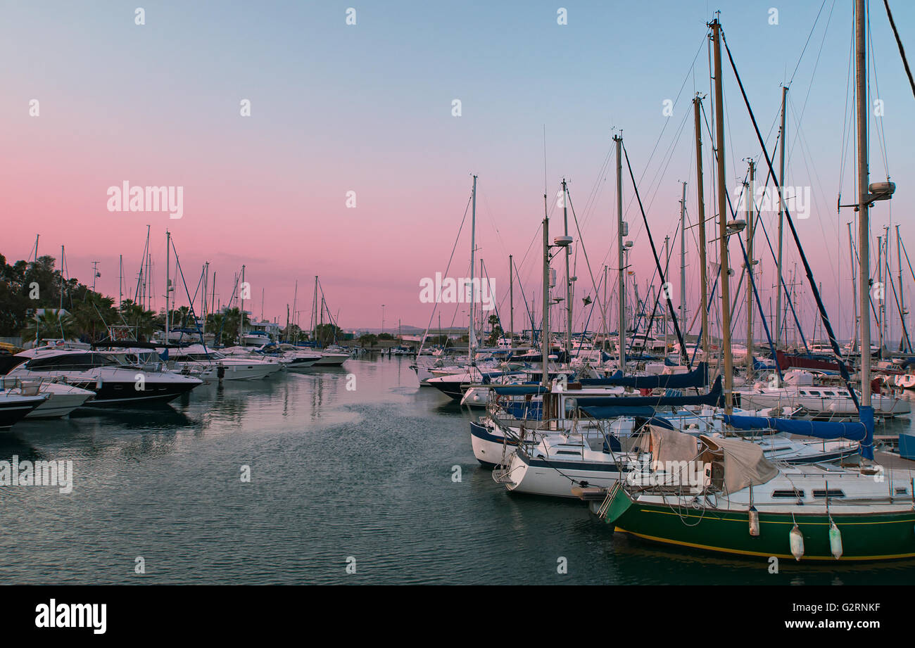 Sunset in Larnaka marina, Cyprus. Yachts and boats in port Stock Photo ...