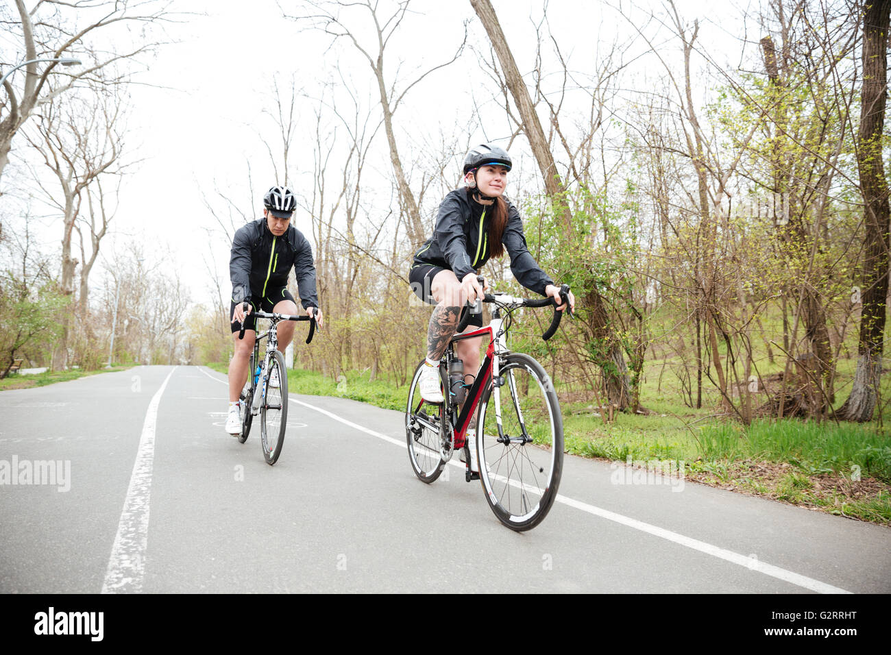 Romantic couple with bicycle hi-res stock photography and images - Alamy