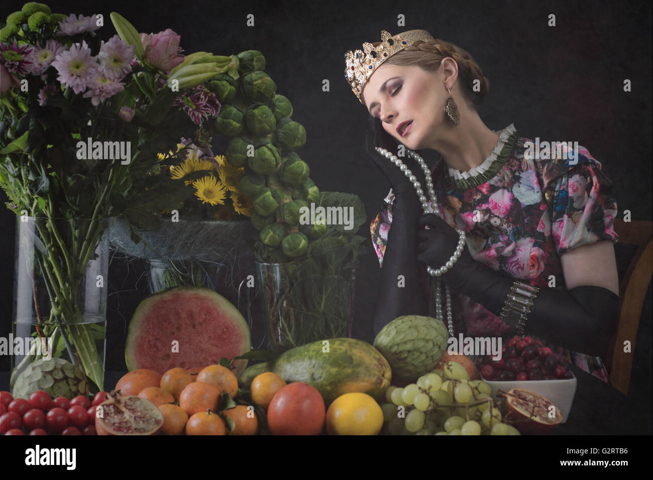 Beautiful woman with pearls and still life Stock Photo - Alamy