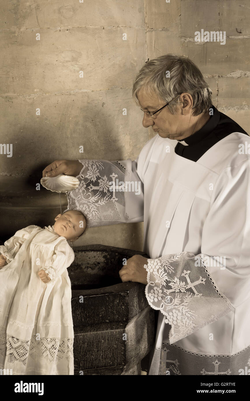 Priest blessing child hi-res stock photography and images - Alamy