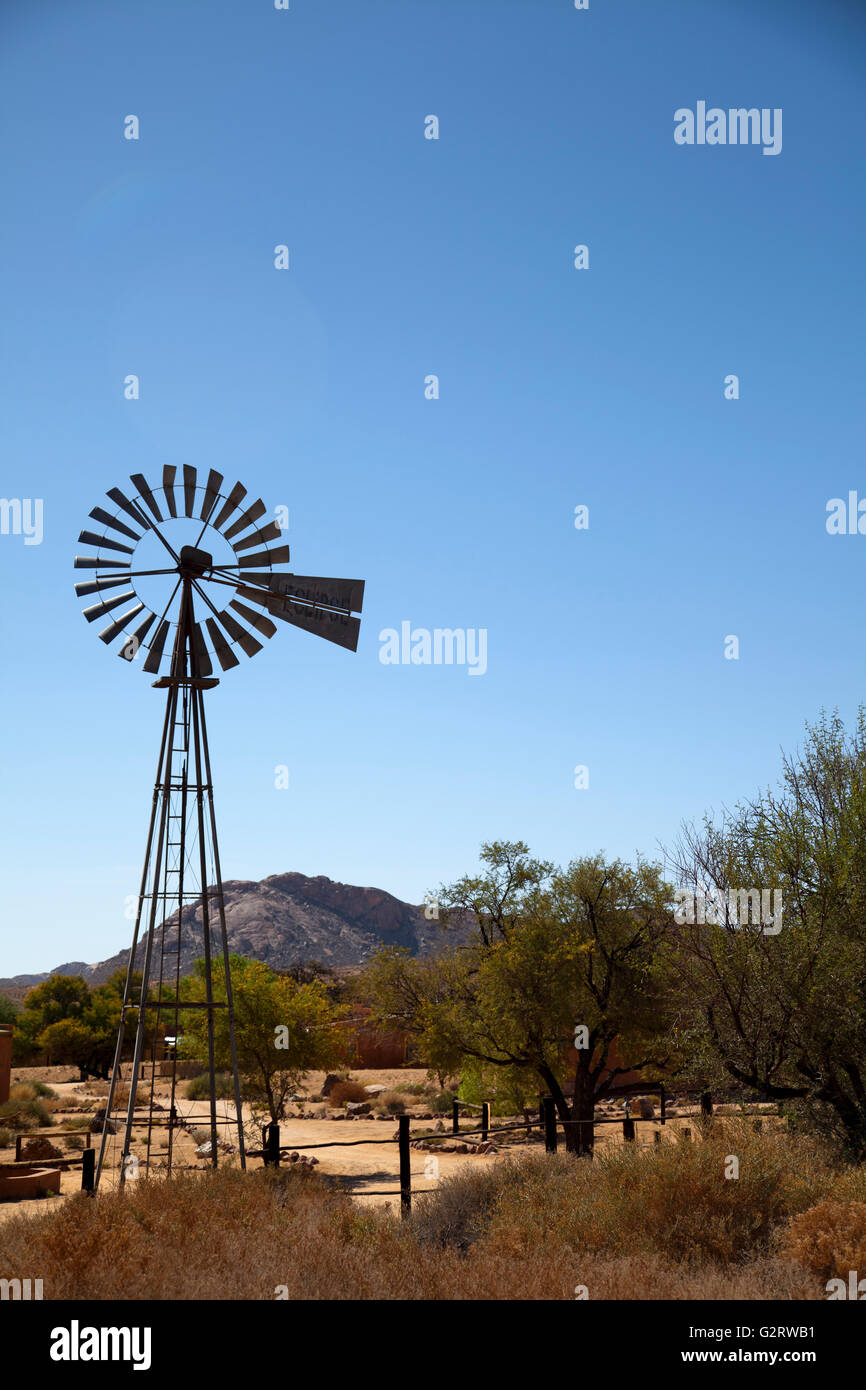 Klein Aus Vista Landscape with Windmill in Namibia Stock Photo - Alamy