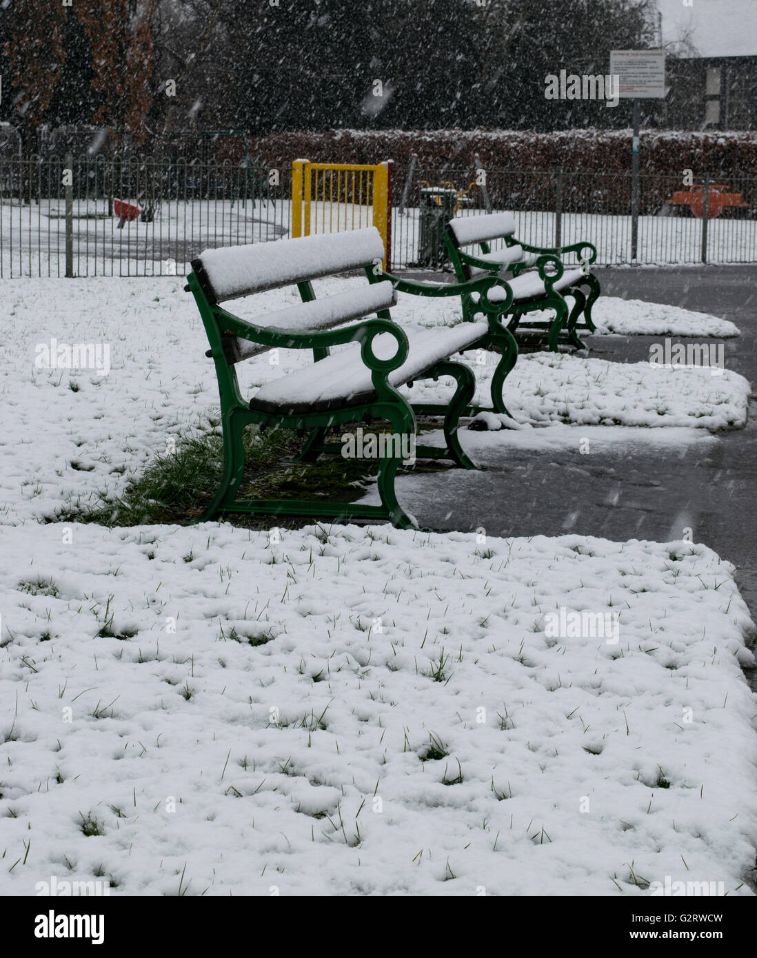 Snow bench in park Stock Photo - Alamy