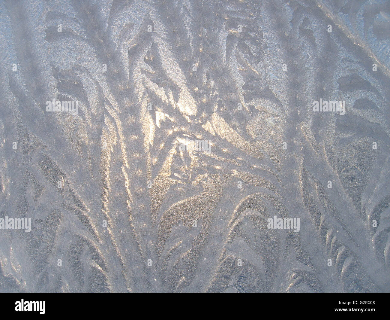 Frosty natural pattern on winter glass Stock Photo - Alamy