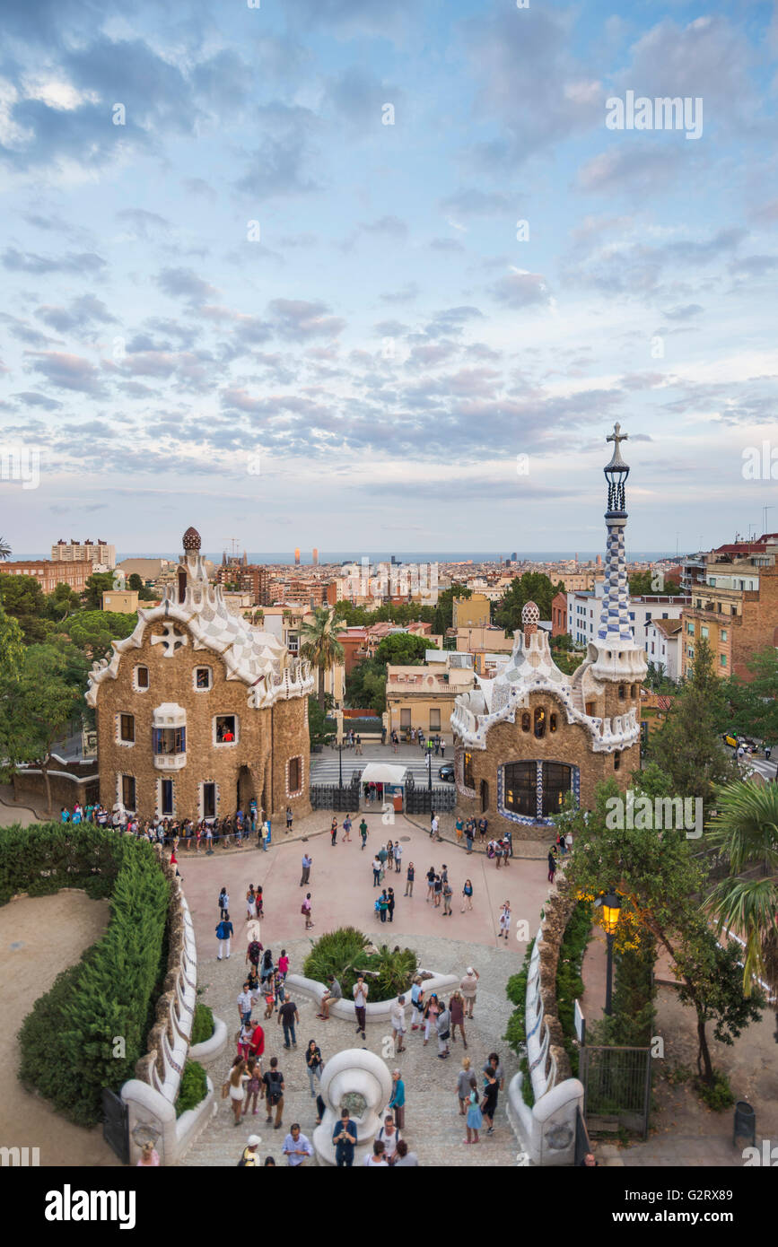 The iconic Gaudi buildings inside the Park Guell and a cloudy day ...