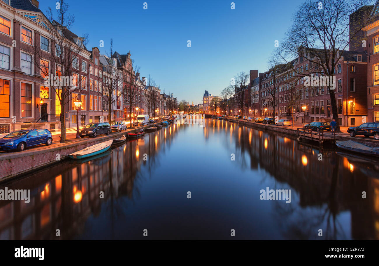 Beautiful night cityscape in Amsterdam, Netherlands. Reflected city ...