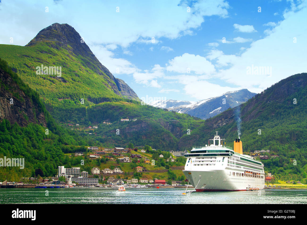 Ferry in Geiranger. bay in the Norwegian mountains Stock Photo - Alamy