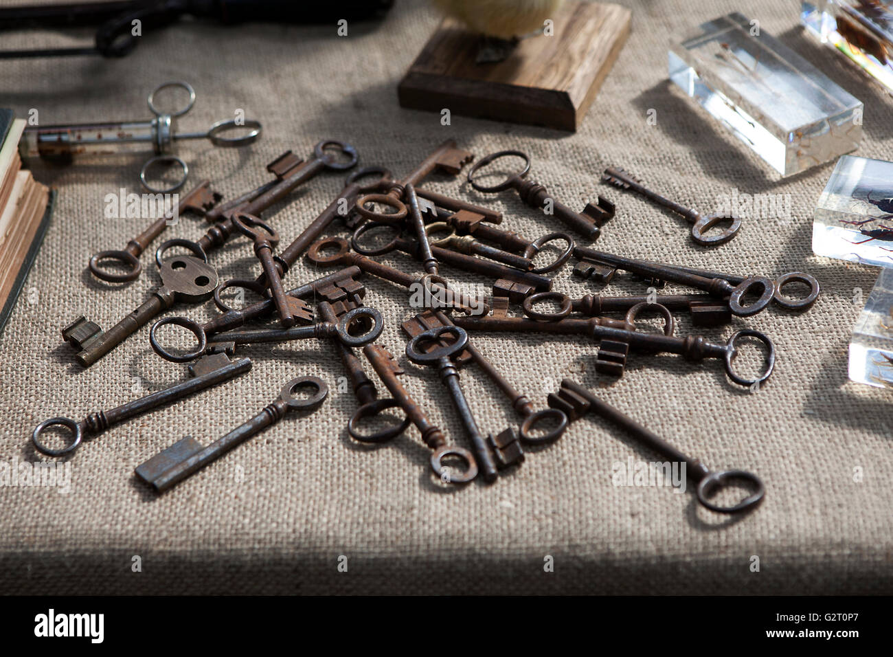 Many old keys on a well used old canvas Stock Photo - Alamy