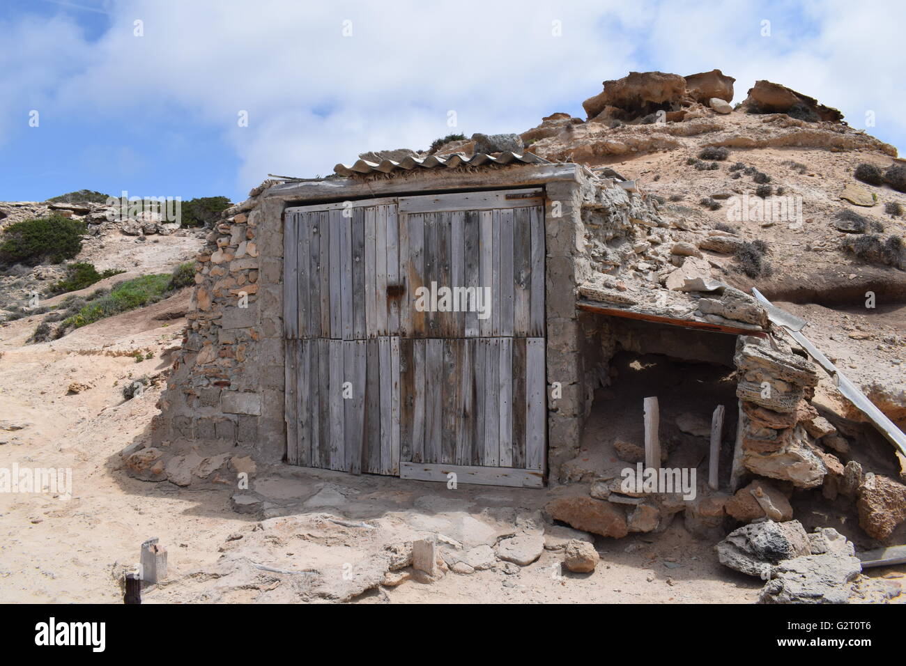 Locked fishing boat shed at Calo des Mort, Formentera Stock Photo - Alamy