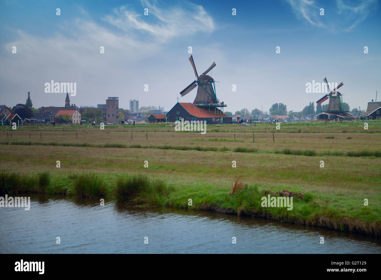 Traditional Dutch windmills with canal near the Amsterdam, Holland ...