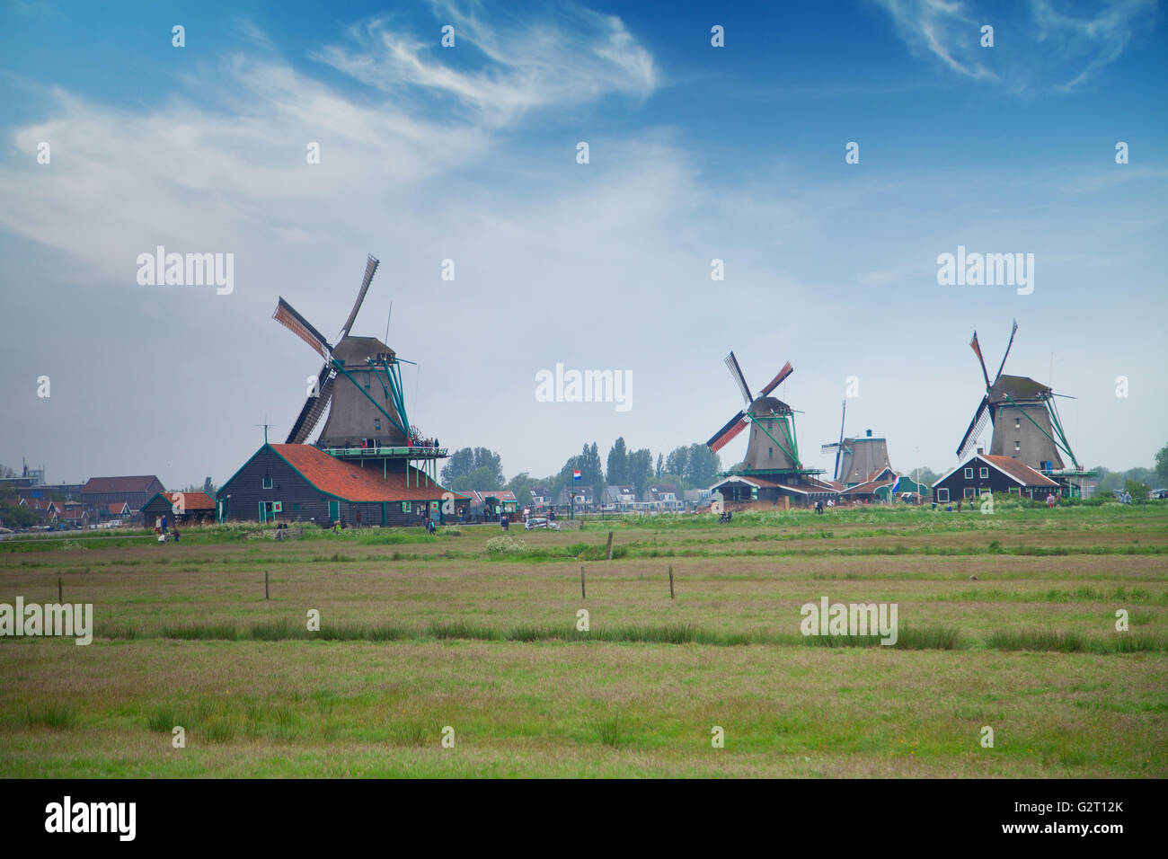 Traditional Dutch windmills with canal near the Amsterdam, Holland ...