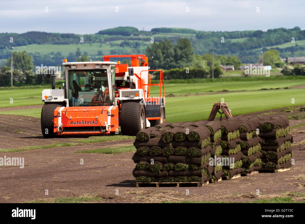 AutoStacker Automatic stacking turf harvester is powered by a John ...