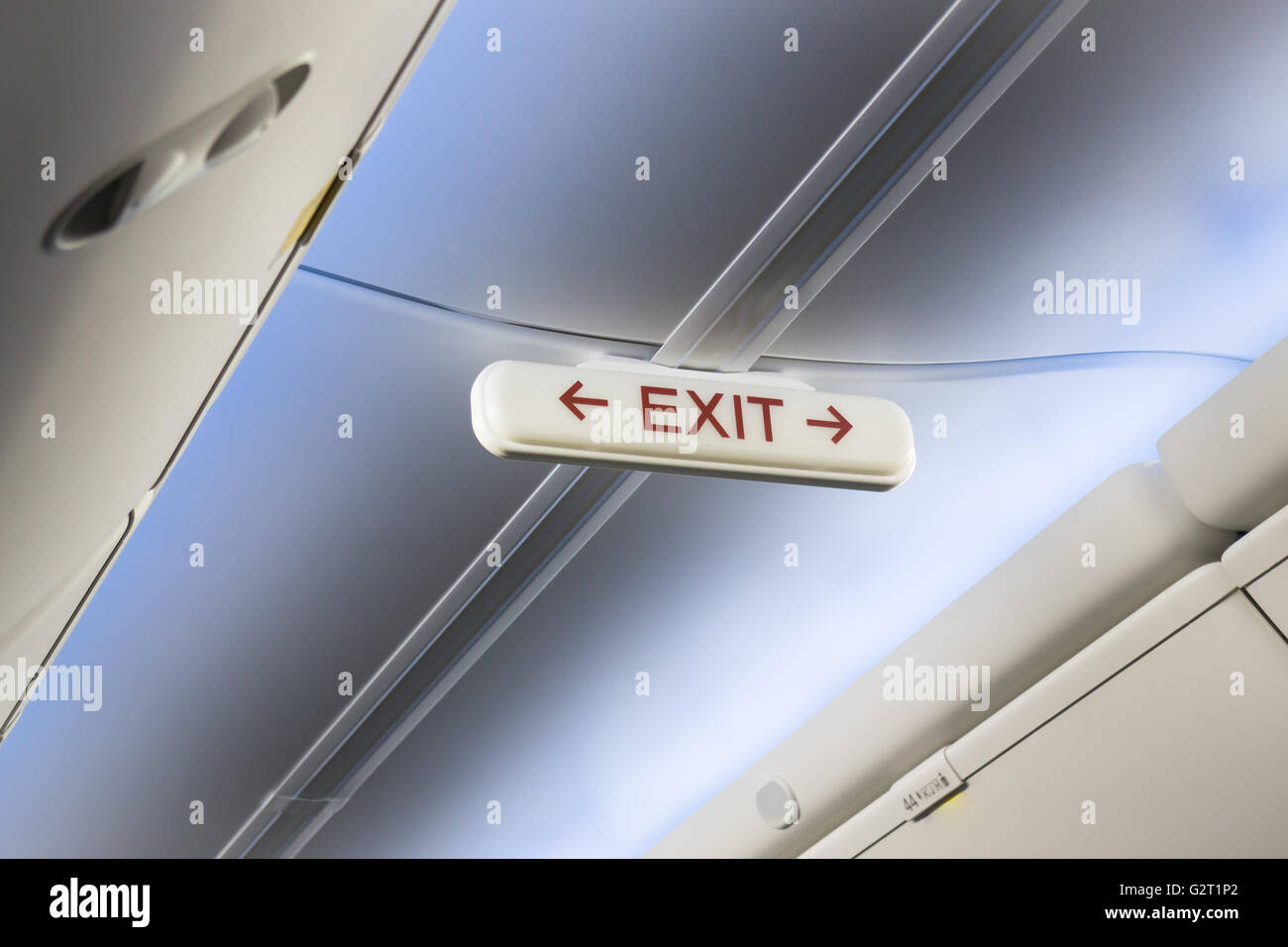 Airplane cabin interior exit sign, stock photo Stock Photo - Alamy