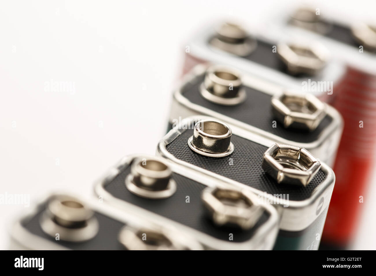 Group of many batterys on white in closeup Stock Photo - Alamy