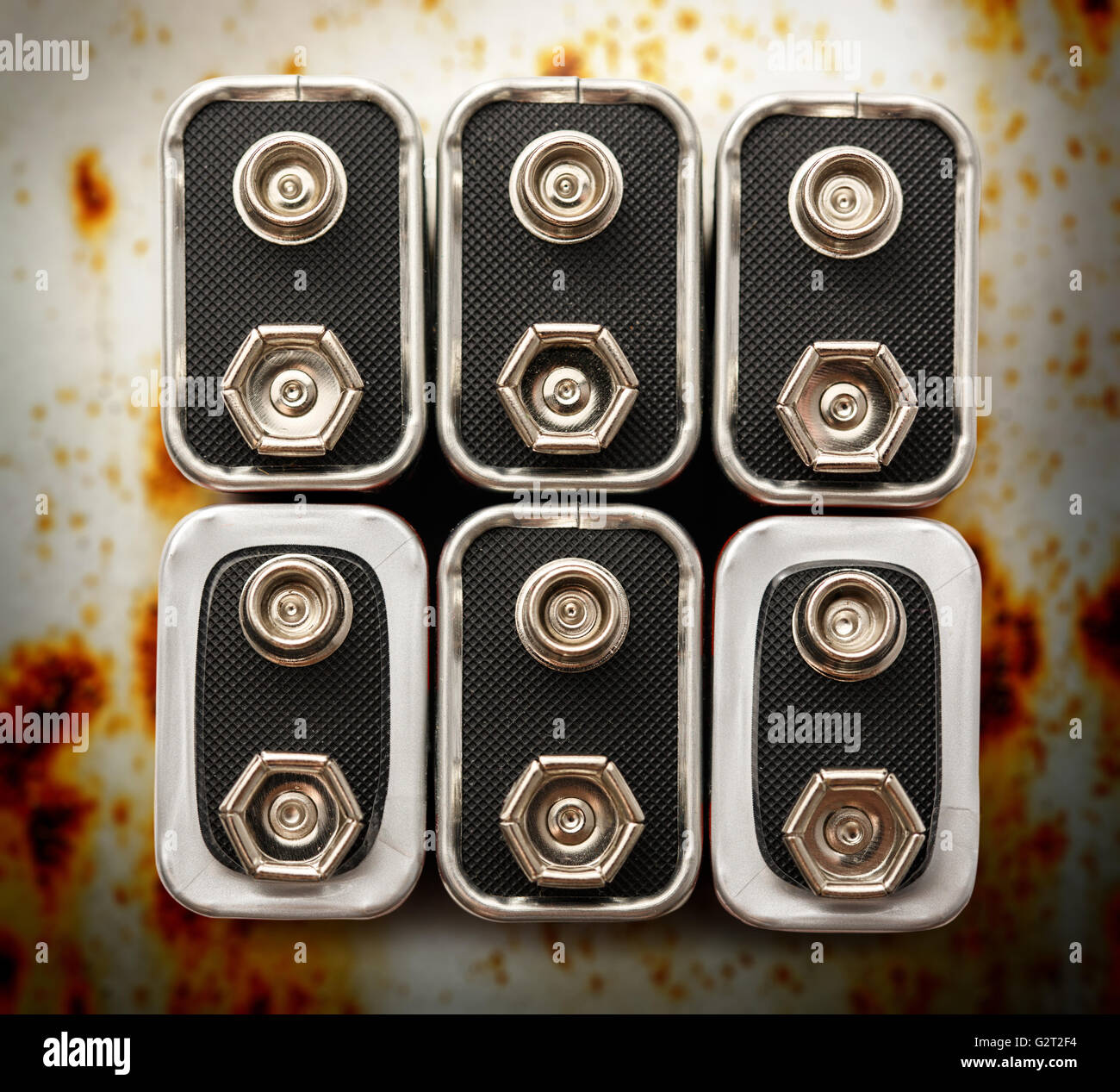 Group of many batterys on metal background in closeup Stock Photo - Alamy
