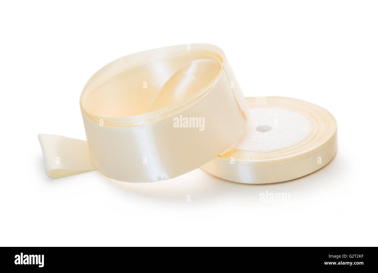 Cream ribbon in roll on white background Stock Photo - Alamy