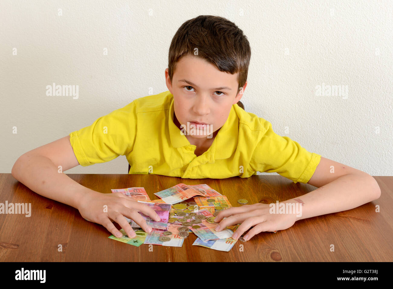 Child showing proudly his money Stock Photo - Alamy
