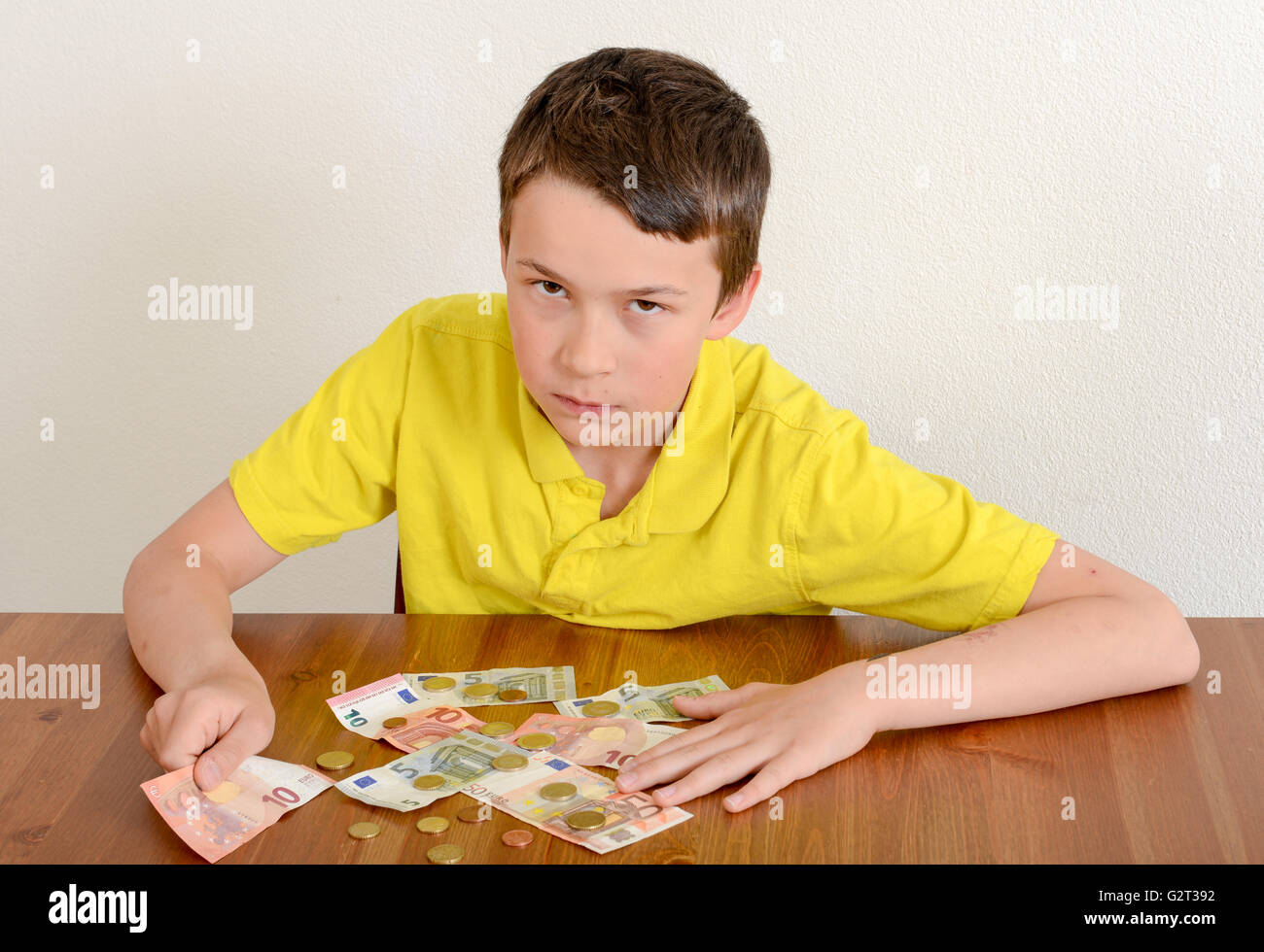 Child showing proudly his money Stock Photo - Alamy