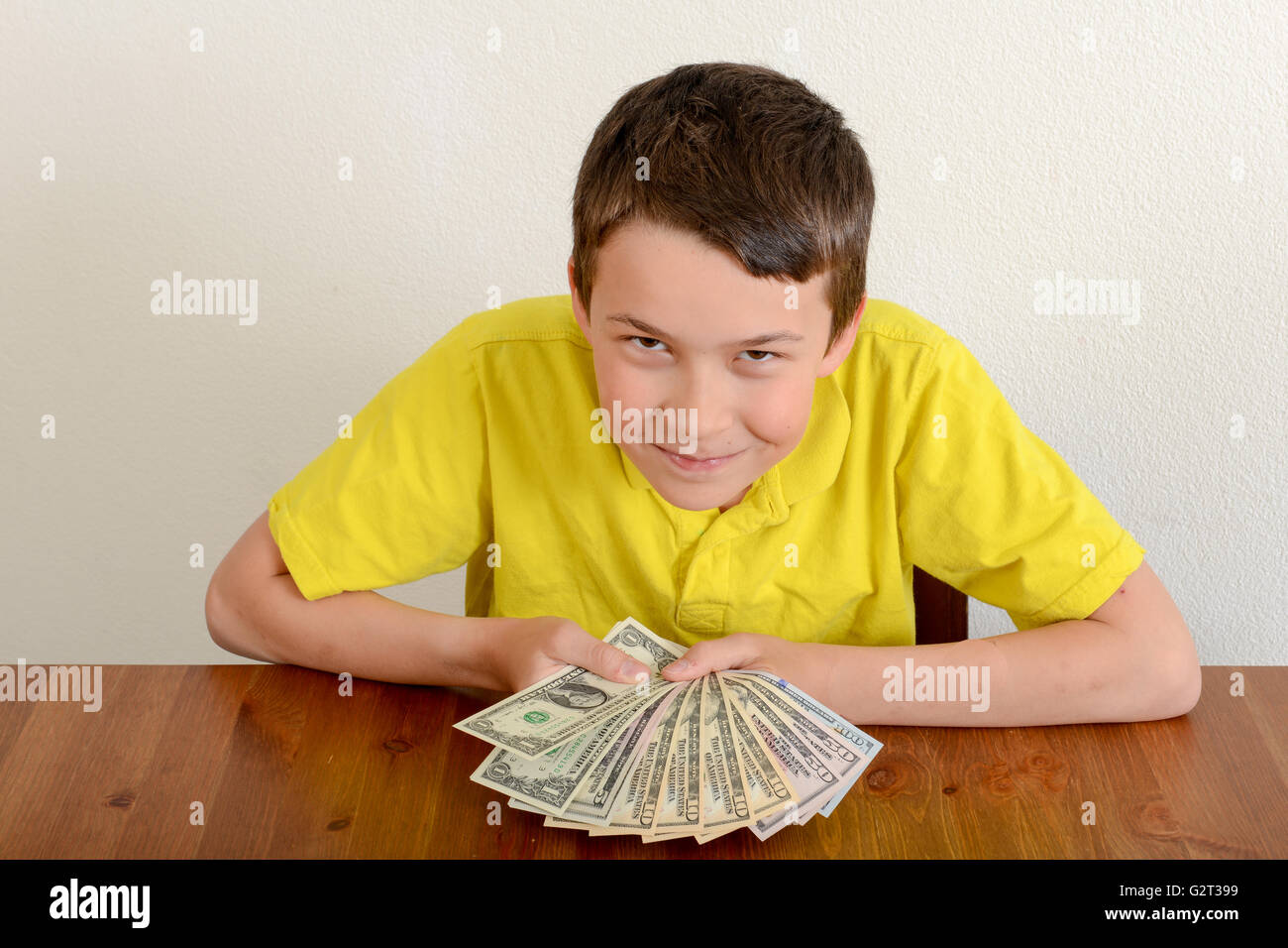 Child holding one dollar bill hi-res stock photography and images - Alamy