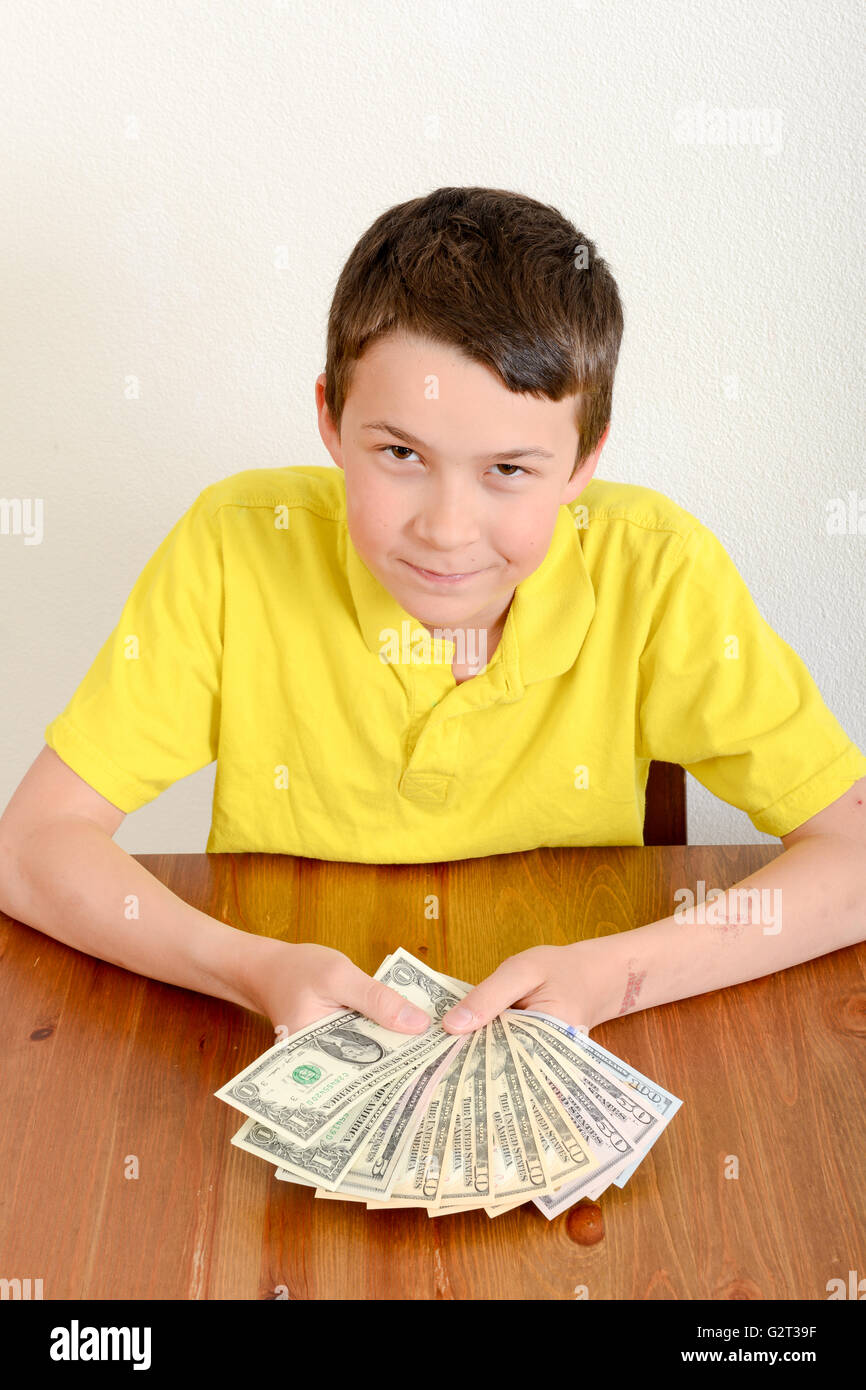 Child holding one dollar bill hi-res stock photography and images - Alamy