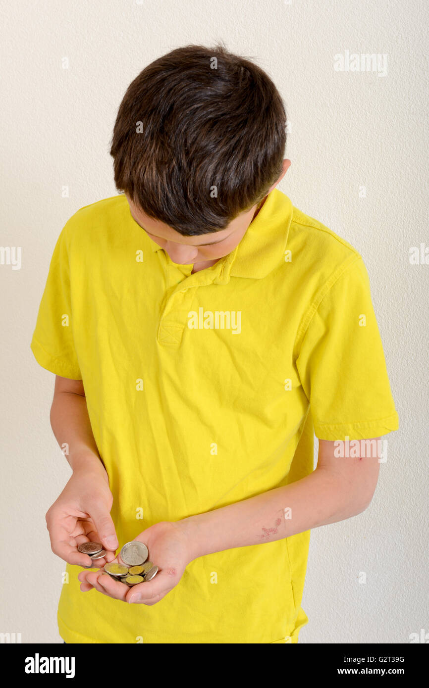 Student counting coins hi-res stock photography and images - Alamy